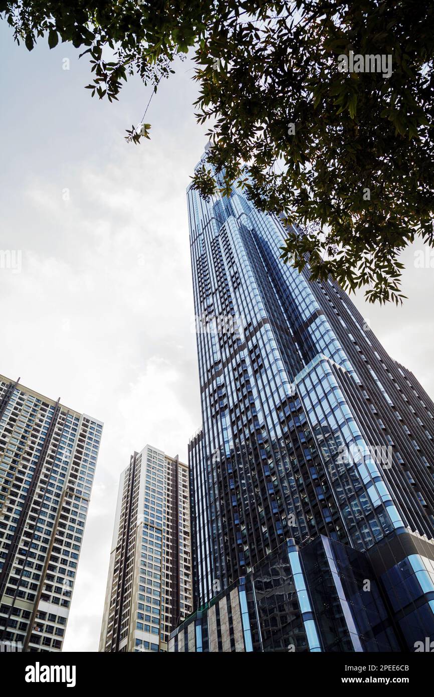 Low angle view of modern office buildings made of reflective glass ...