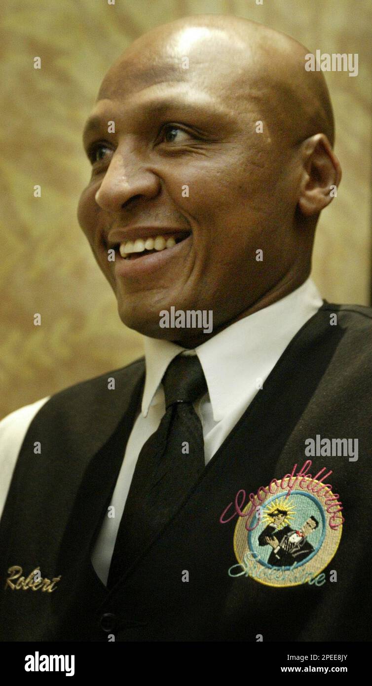 ** ADVANCE FOR WEEKEND FEB. 5-6 ** Robert Waititu is shown next to a shoeshine stand Mandalay ...