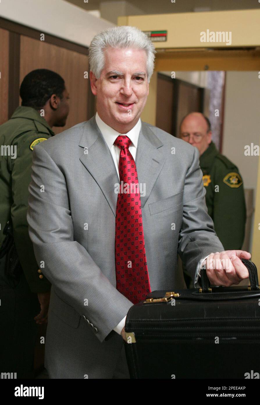 Defense attorney Brian Oxman smiles as he enters the Santa Barbara ...