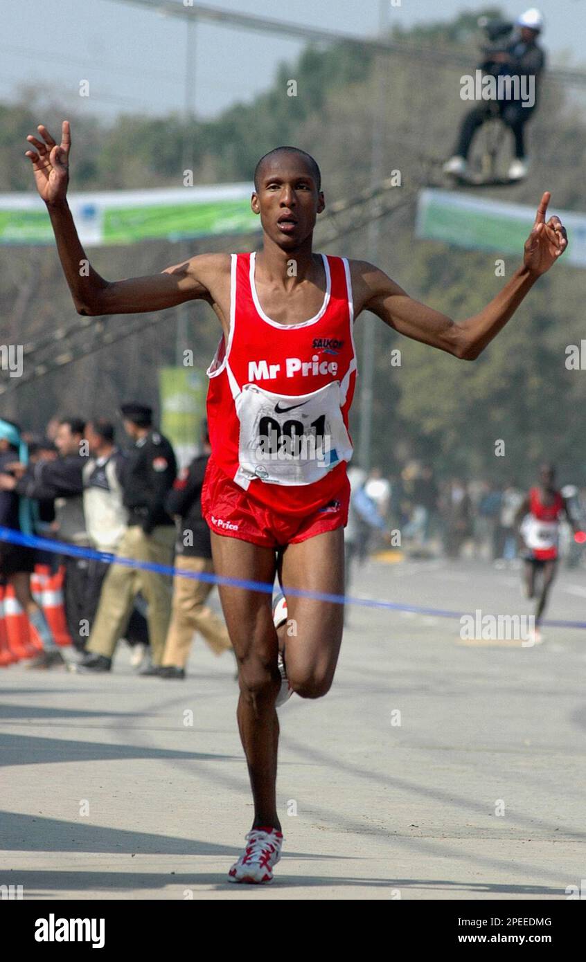 South African athlete Tseko Mpolokeng crosses the finish line during ...