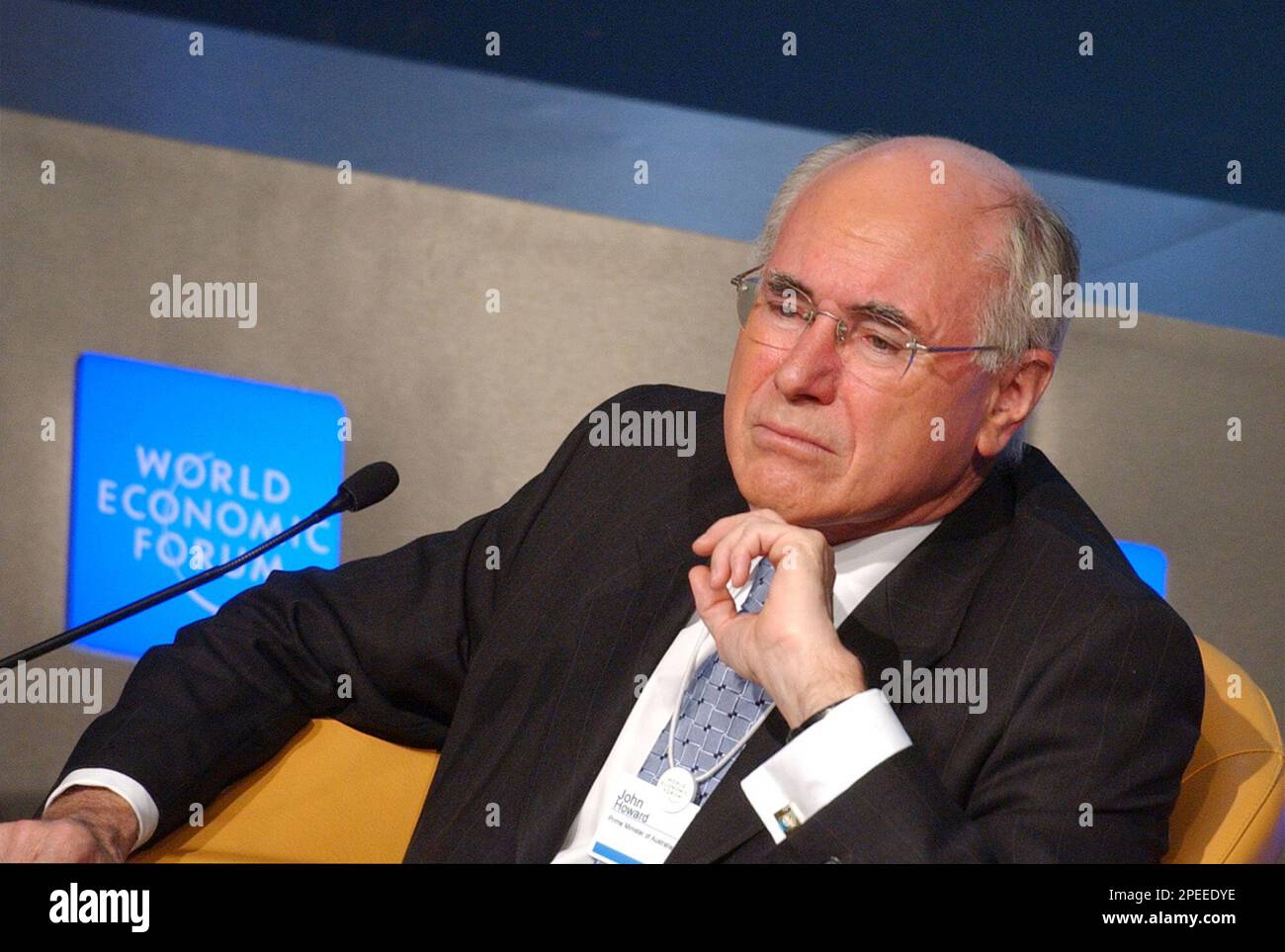 Australian Prime Minister John Howard listens to speeches during the ...