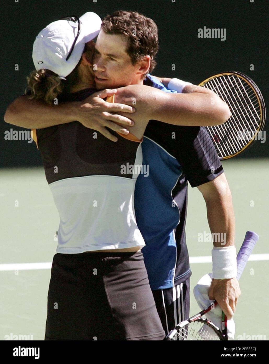 Australia's Scott Draper, right, and Samantha Stosur hug each other ...