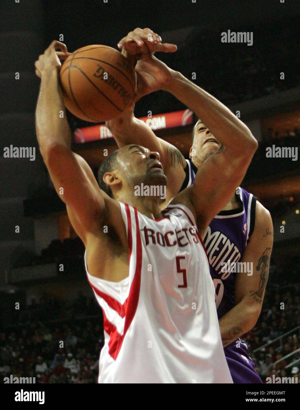 Sacramento Kings' Matt Barnes, right, fouls Houston Rockets' Juwan ...