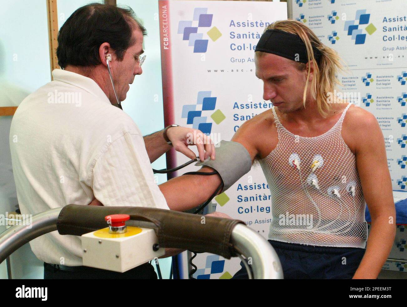Argentine soccer player Maxi Lopez, right, is seen during a medical ...