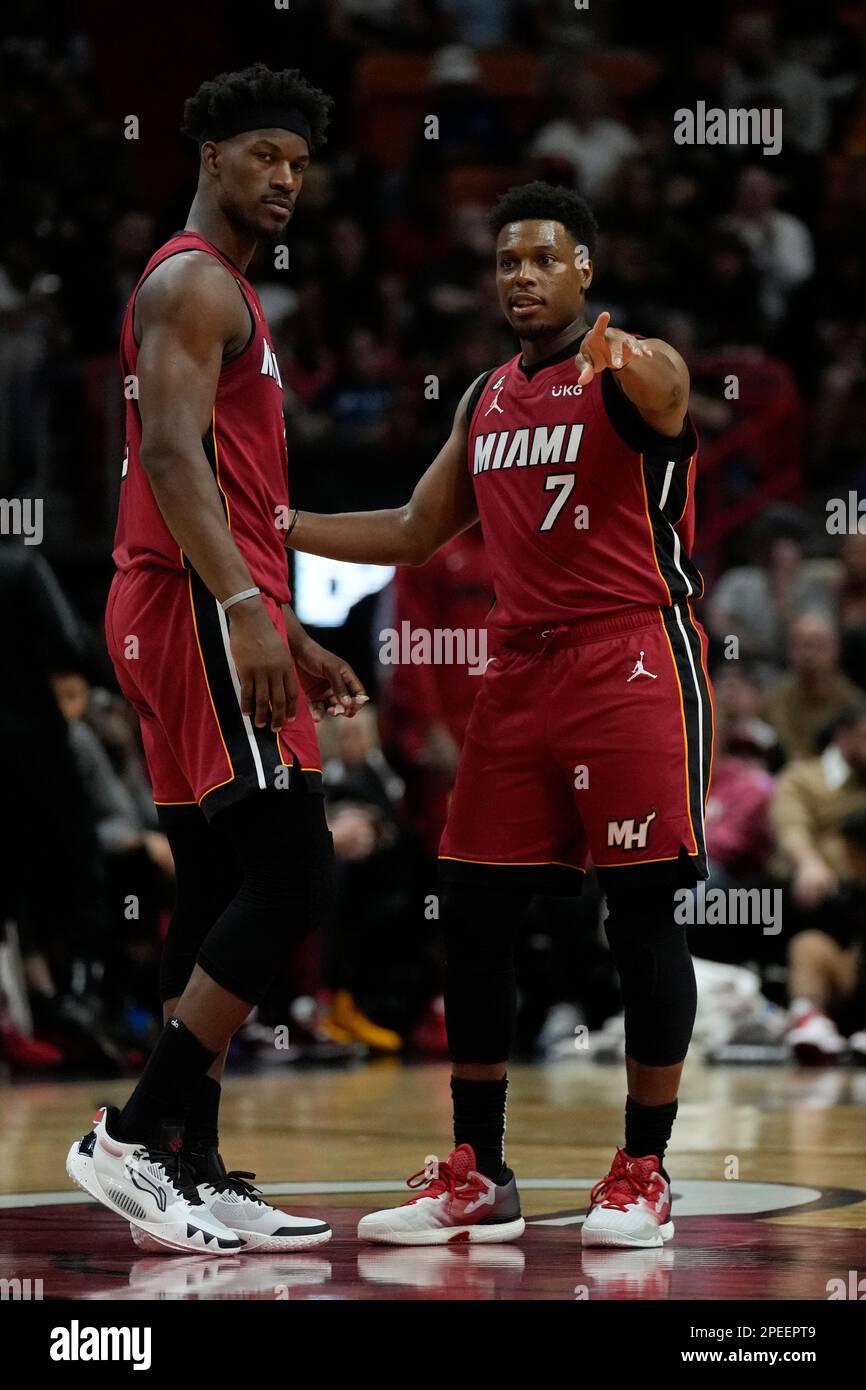 Miami Heat forward Jimmy Butler talks with Miami Heat guard Kyle Lowry (7) on the court during ...