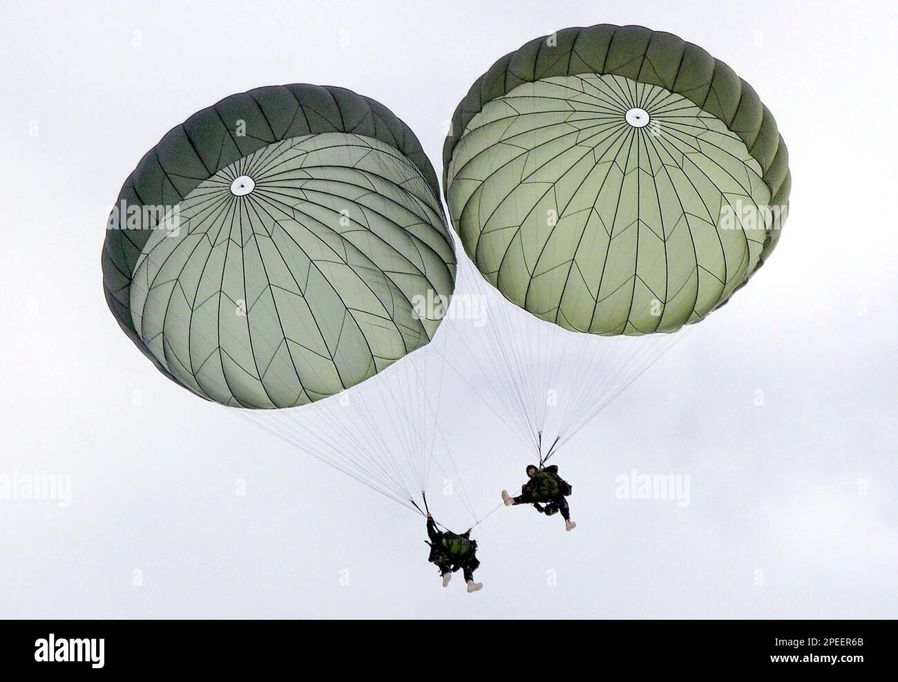 U.S. Army paratroopers Spec. Casey Wright , left, and Sgt. Michael ...