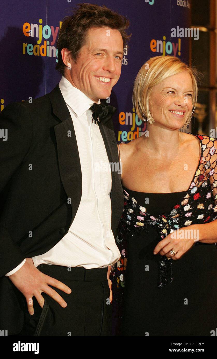British actor Hugh Grant, left, and journalist Mariella Frostrup pose ...