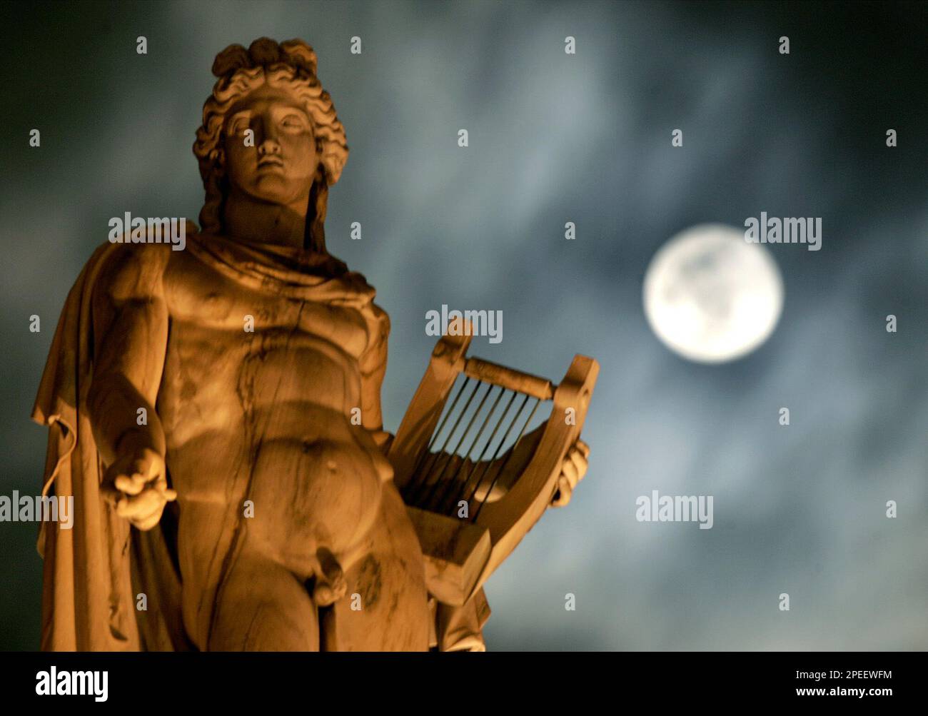 The statue of Apollo, the Greek mythological god of the sun, is ...