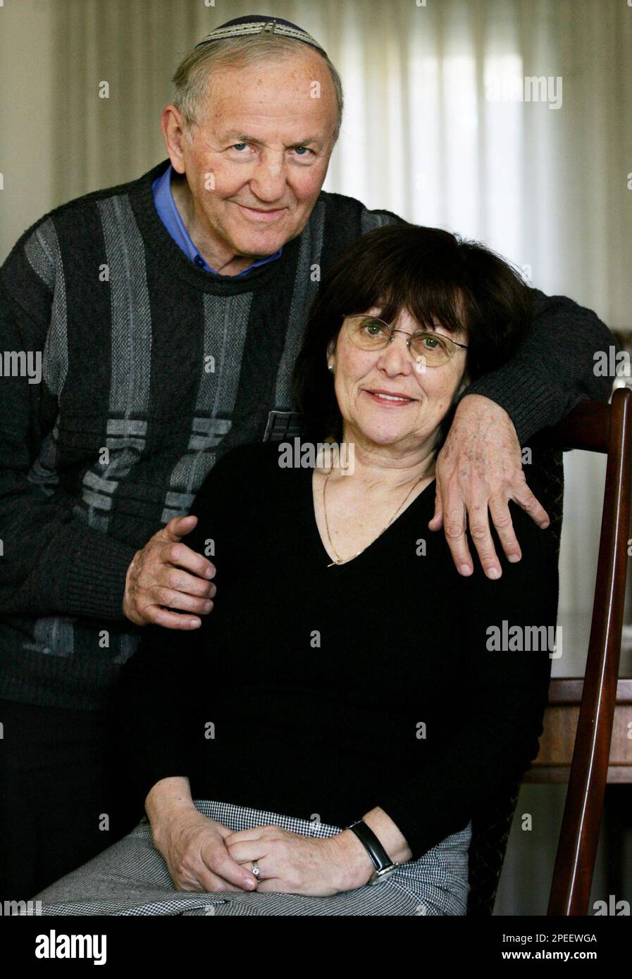 Holocaust survivor Martha Weiss of Australia is seen with her husband ...