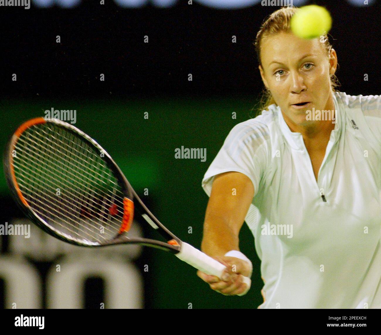 Alicia Molik of Australia, 10th seed, hits a forehand return to Venus ...