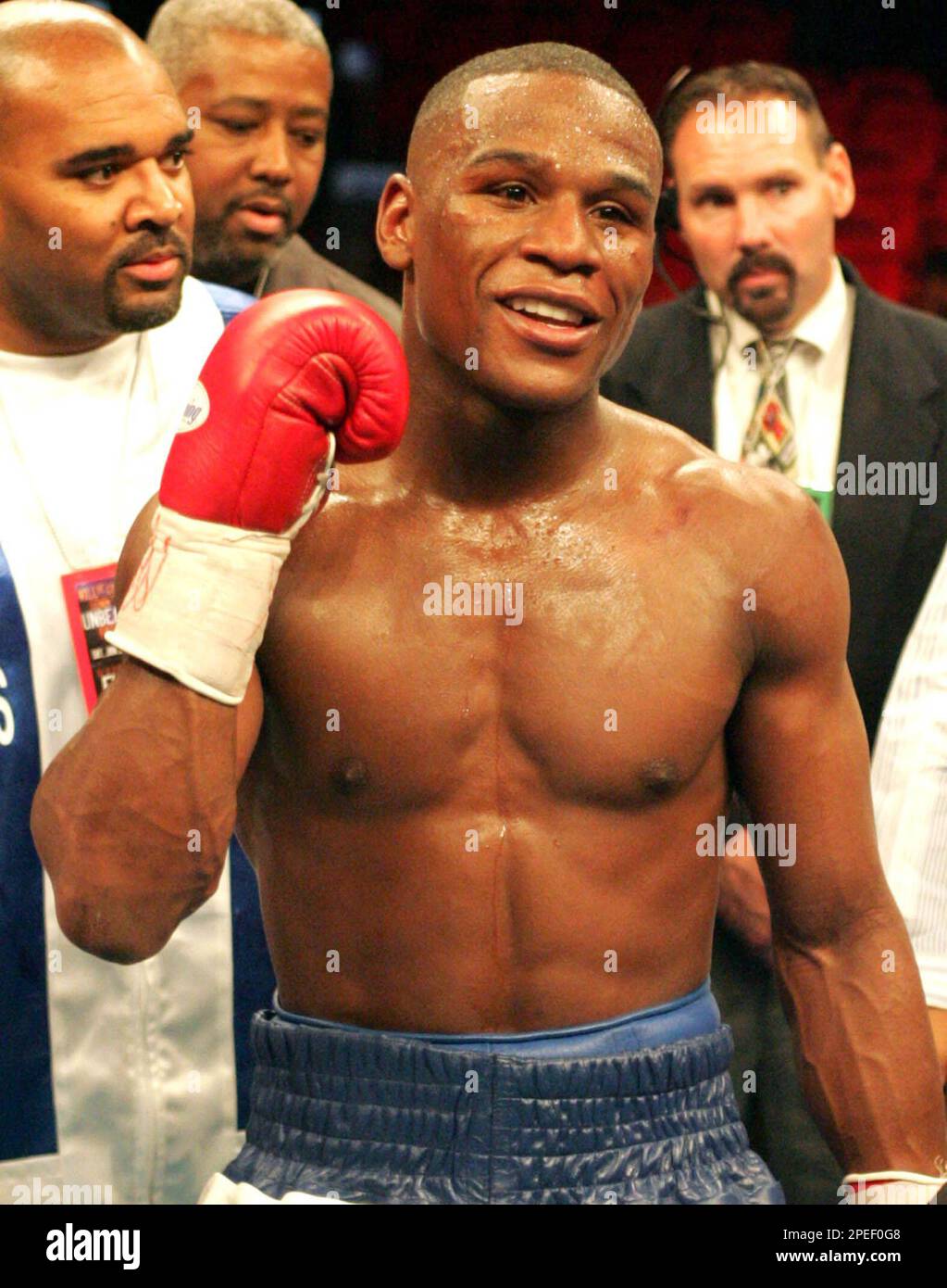 Floyd Mayweather Jr., smiles after his 8th round TKO WBC super lightweight eliminator victory ...