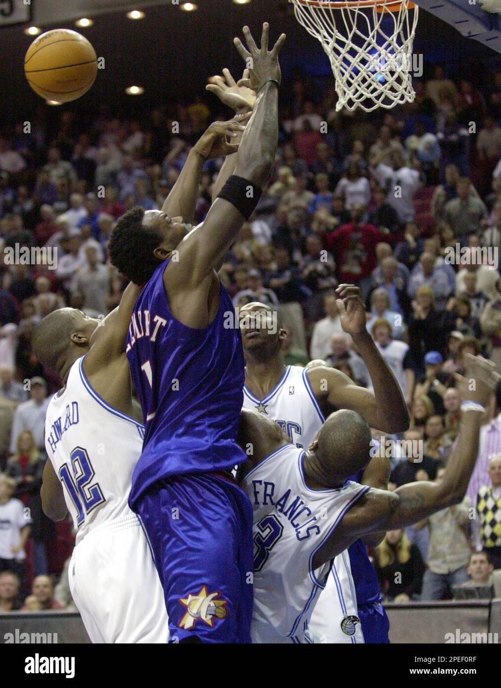 Orlando Magic's Dwight Howard (12), Steve Francis (3) and Stacey Augmon ...