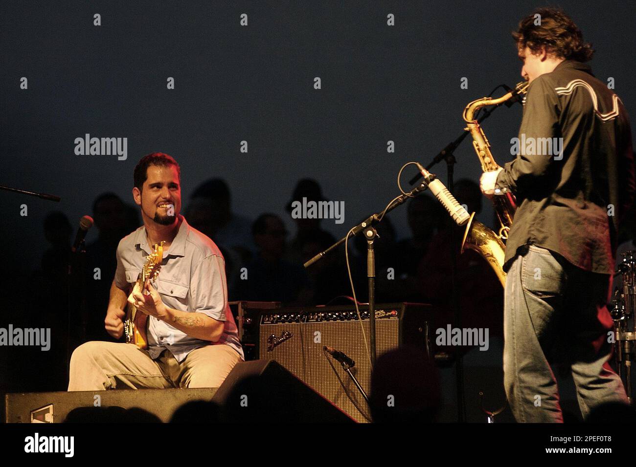 Charlie Hunter, left, in the guitar and John Ellis in the saxophone ...