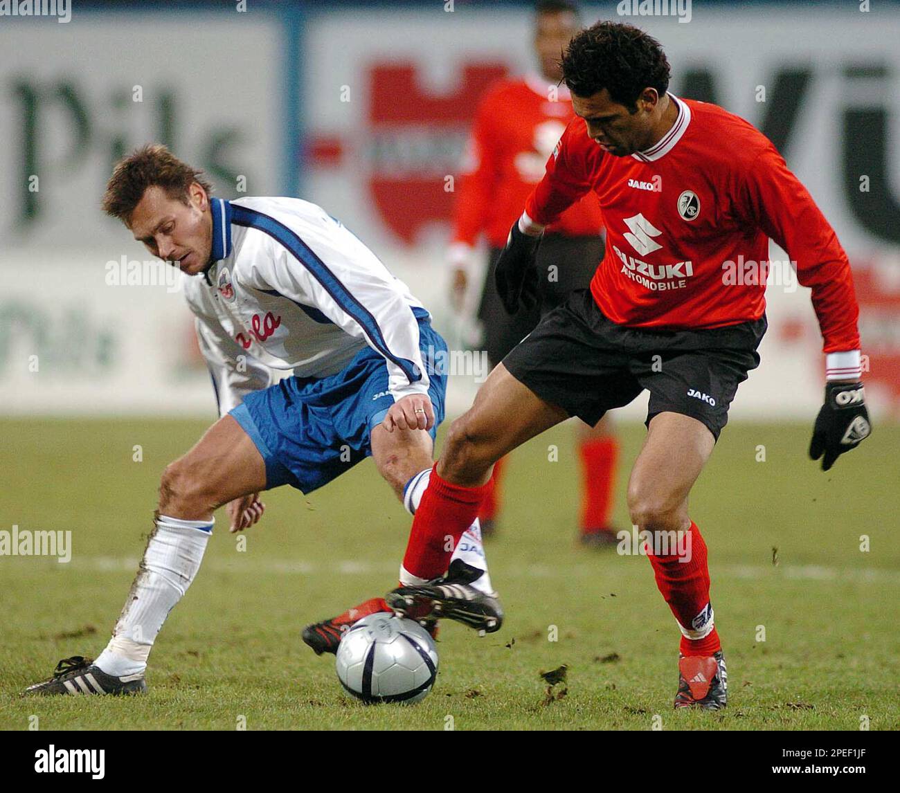 Rostock's Marcus Lantz from Sweden player and Freiburg player Roda ...