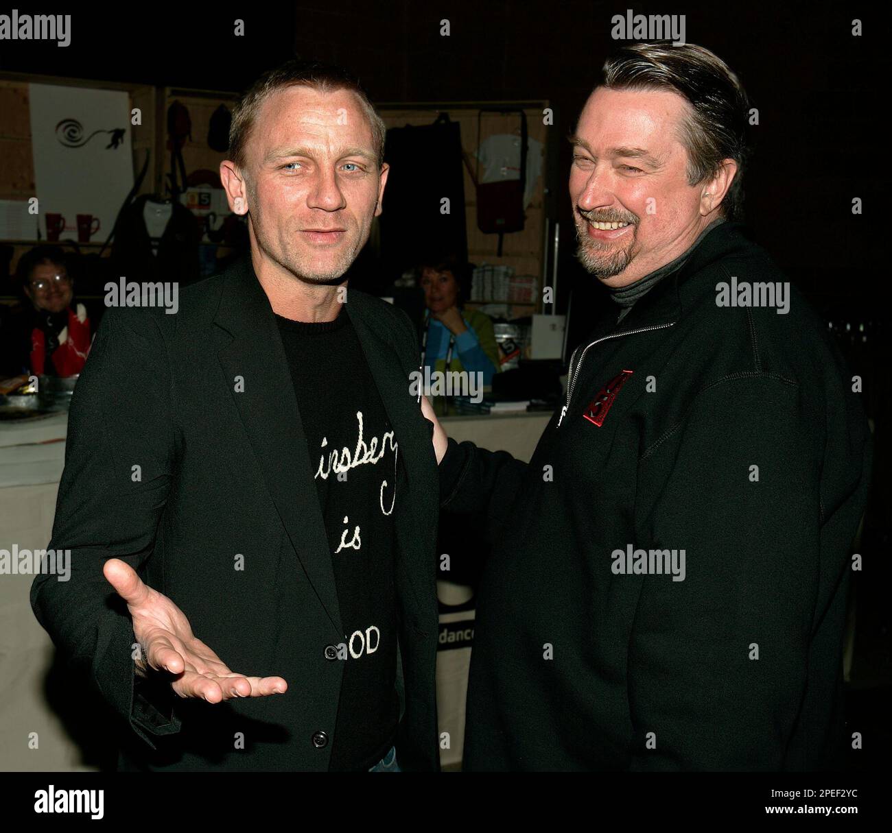 Actor Daniel Craig, left, chats with Geoffrey Gilmore at the premier of ...
