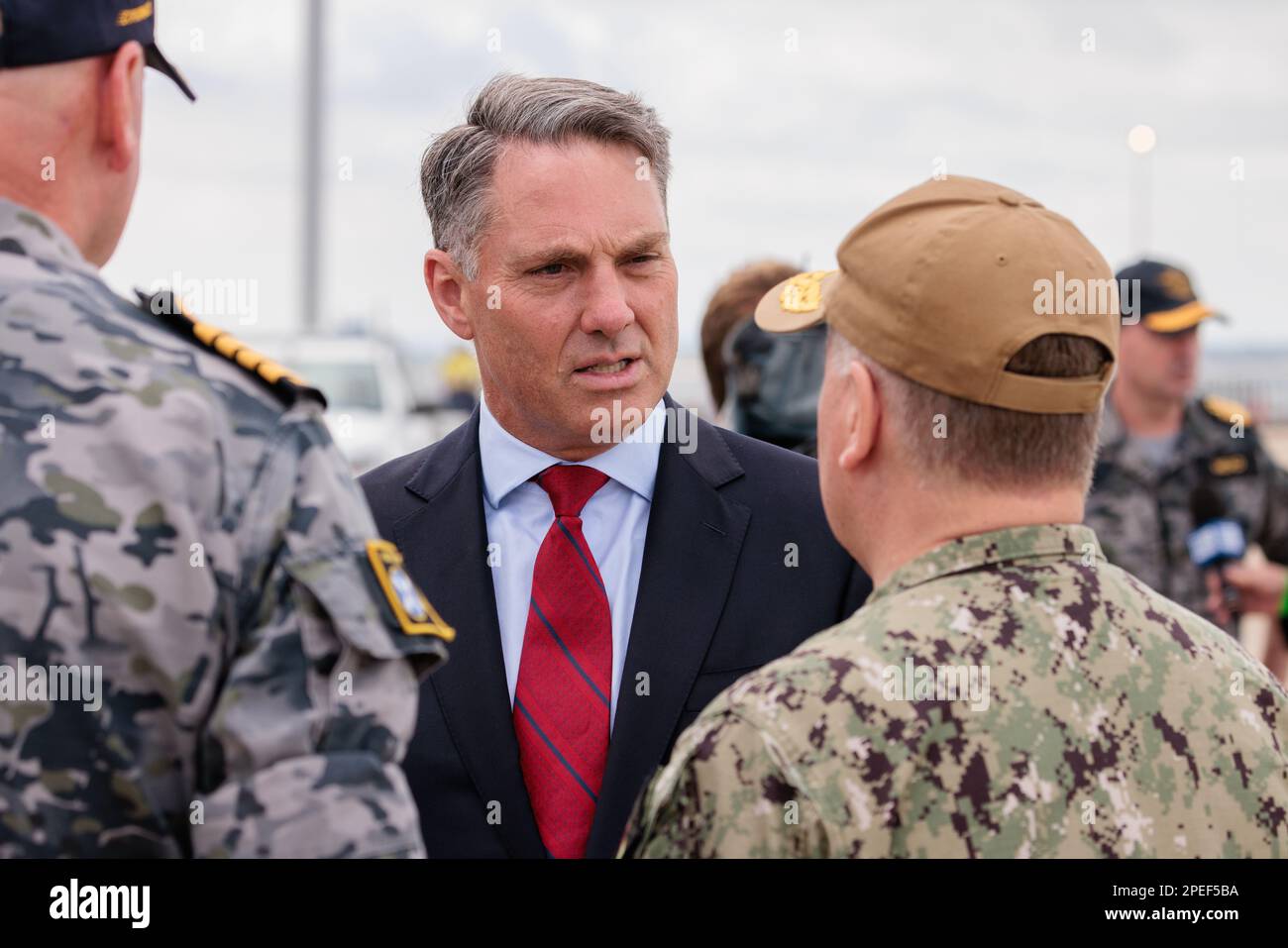 Acting Prime Minister Richard Marles speaks with Rear Admiral Richard ...