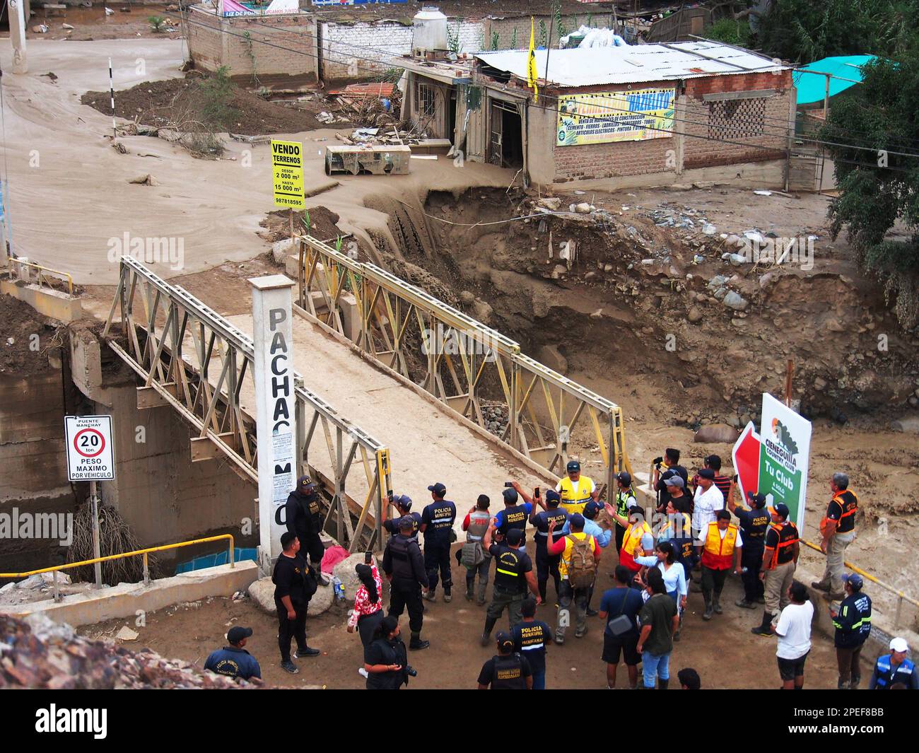 A mudslide destroying the houses in the rural town of Tambo Inga, in ...