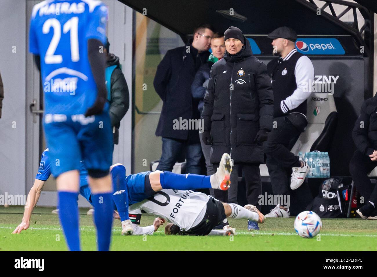 Warsaw, Poland. 12th Mar, 2023. Adam Majewski (C) coach of Stal seen ...