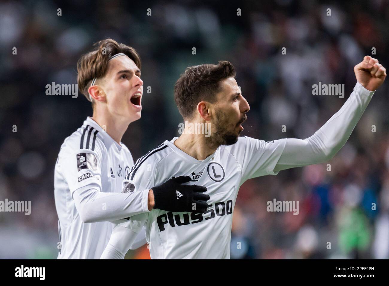 Warsaw, Poland. 12th Mar, 2023. Igor Strzalek (L) and Filip Mladenovic ...
