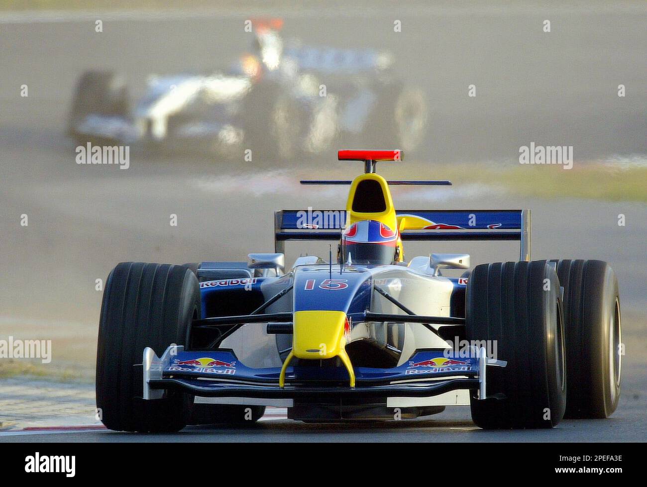 Italian Formula One driver Tonio Liuzzi drives followed by Williams ...
