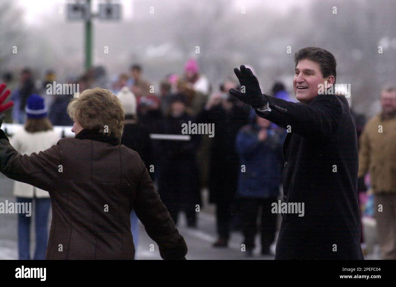 West Virginia Gov. Joe Manchin along with his wife, Gayle, left, wave ...