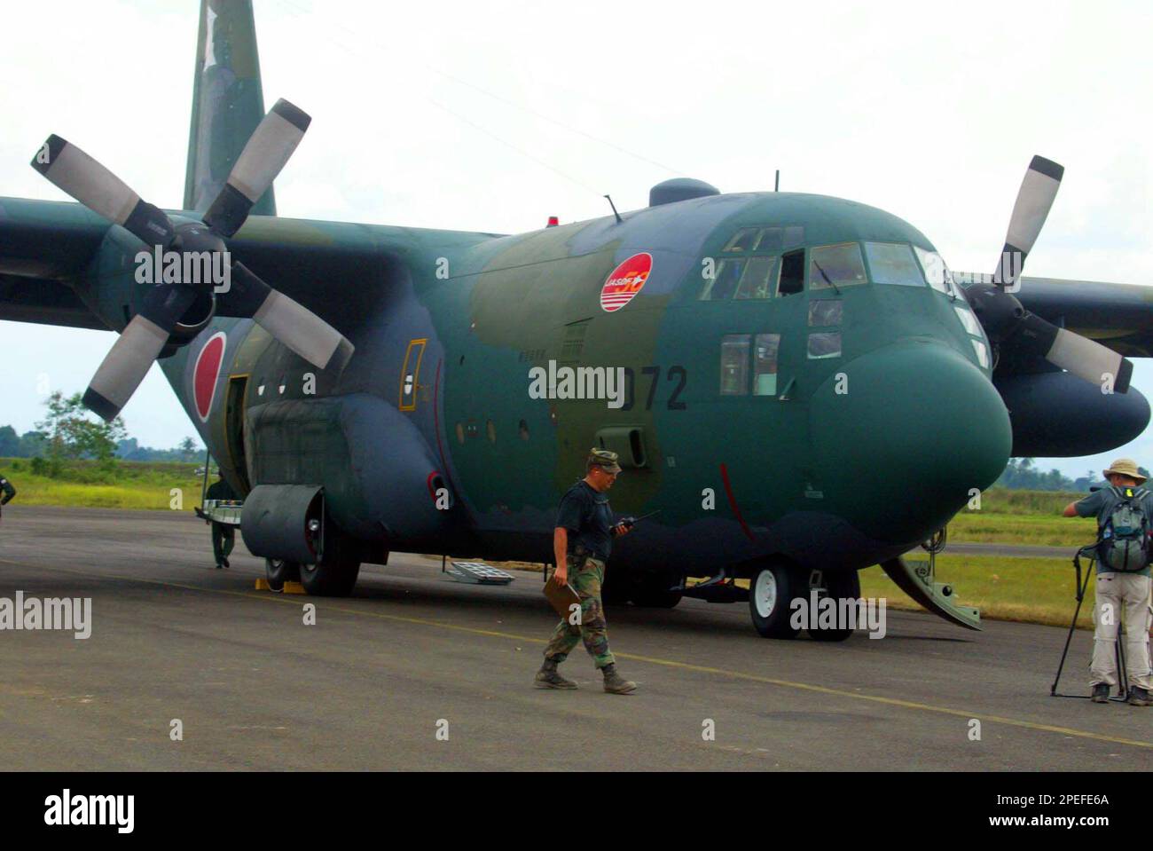 A Japanese transport plane at Banda Aech airport in Indonesia on Sunday ...