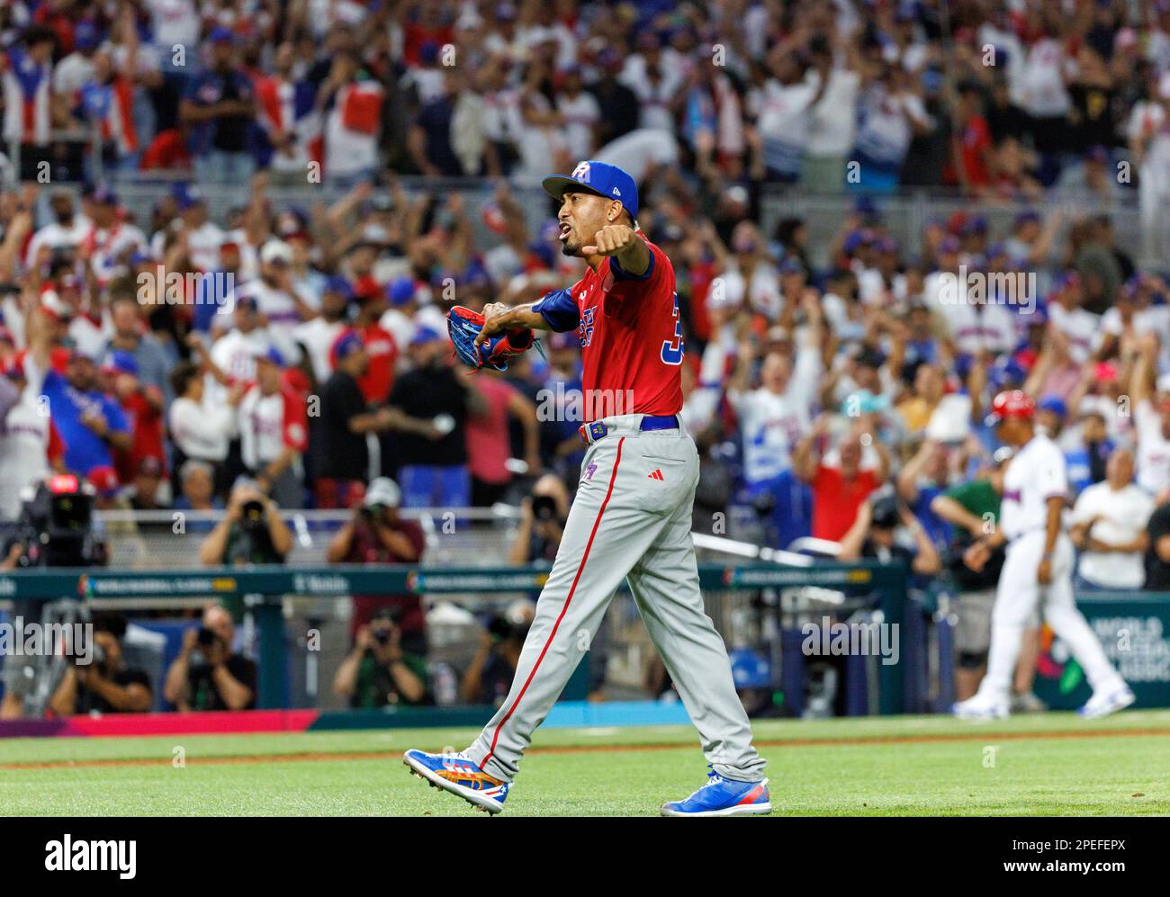 Puerto Rico pitcher Edwin Diaz (39) reacts after the last out after a ...