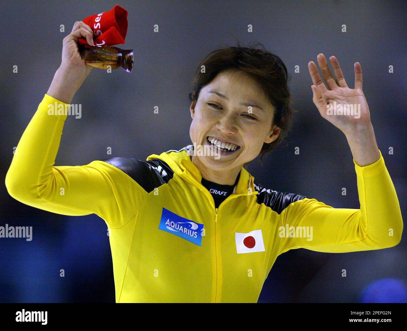 Tomomi Okazaki, of Japan, celebrates her win in the women's 500m event ...