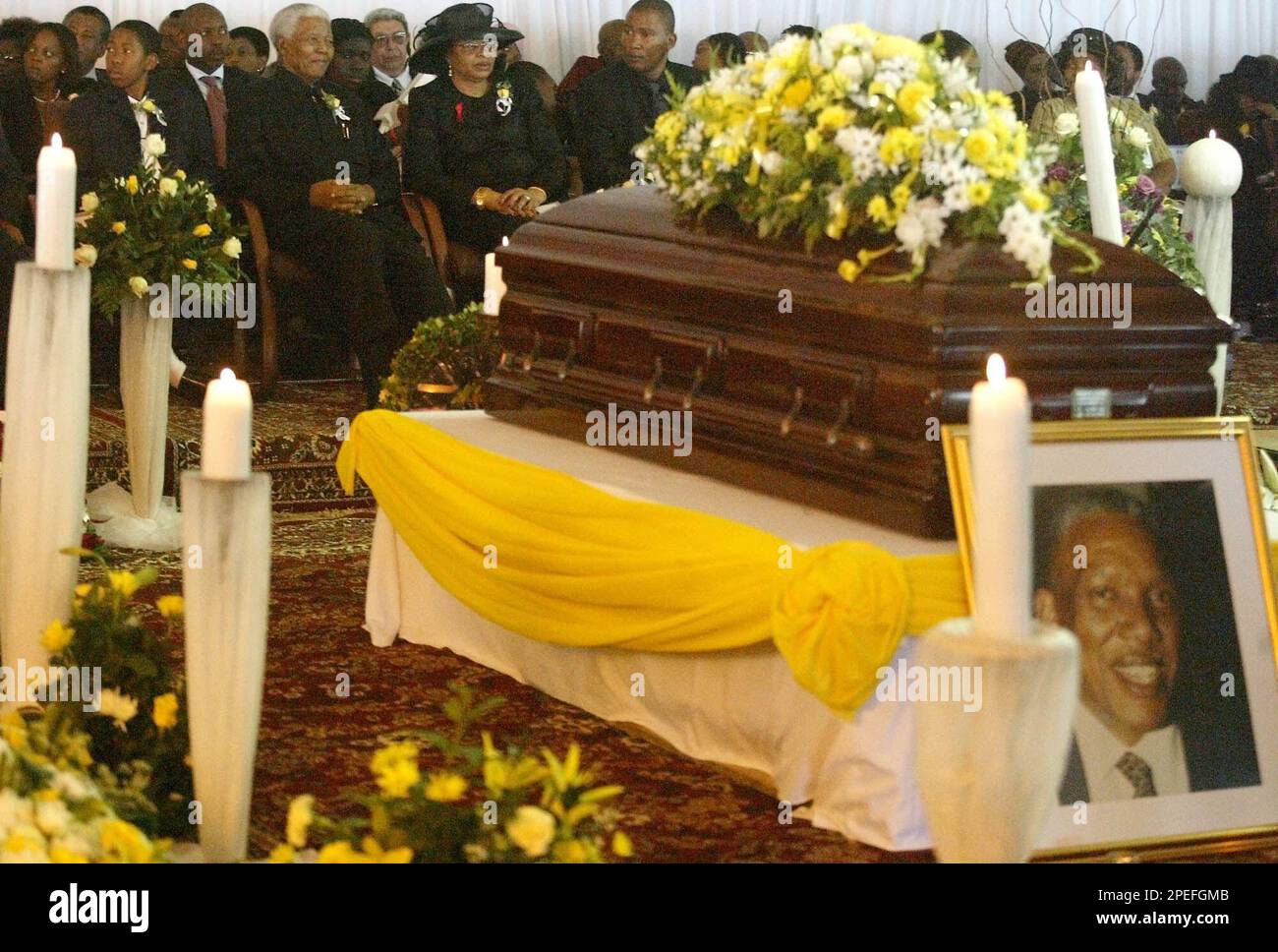 Former President, Nelson Mandela, and his wife Graca Machel, among his ...