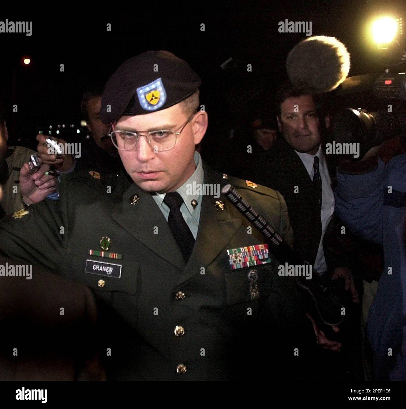 Army Spc. Charles Graner Jr., is followed by the media after he was convicted Friday, Jan. 14 ...