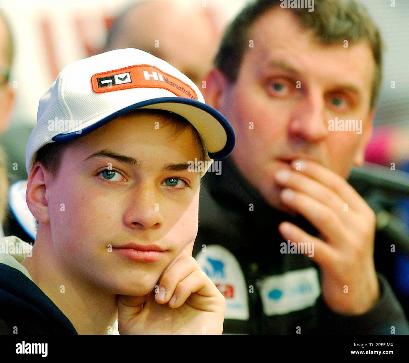 Janek Mela,16, left, and explorer Marek Kaminski during a press ...