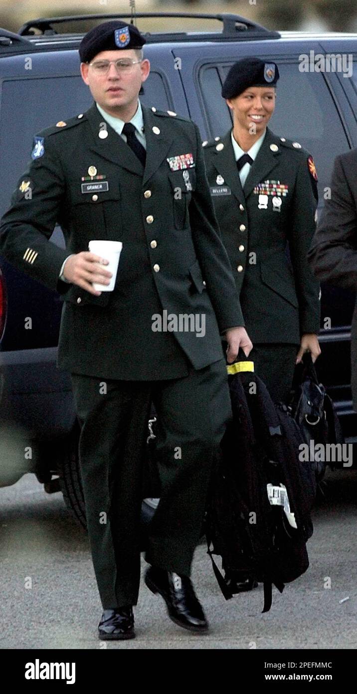 Army Spc. Charles Graner, left, arrives for his court-martial at Fort ...