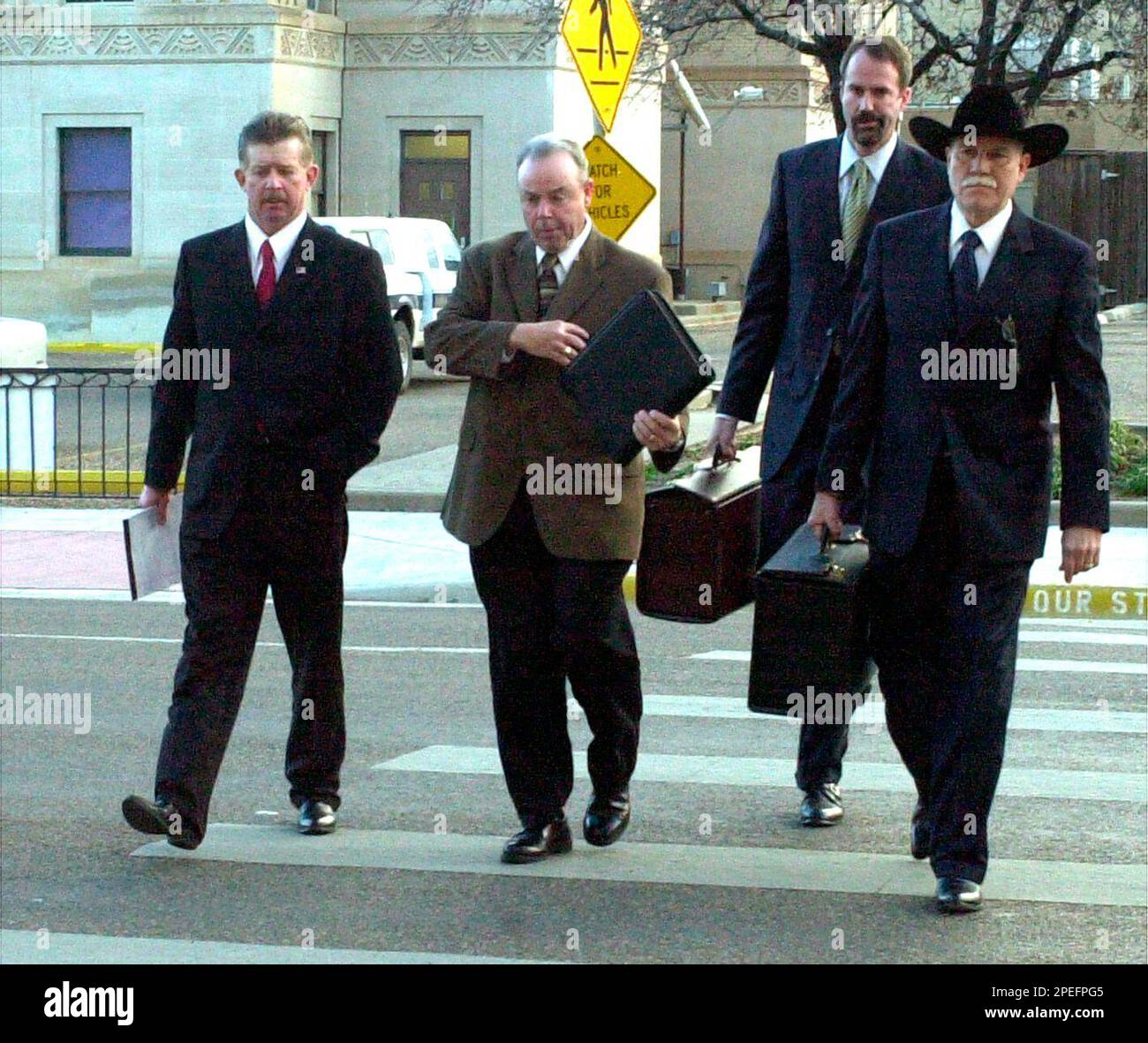 Former undercover agent Tom Coleman, left, arrives with his defense ...