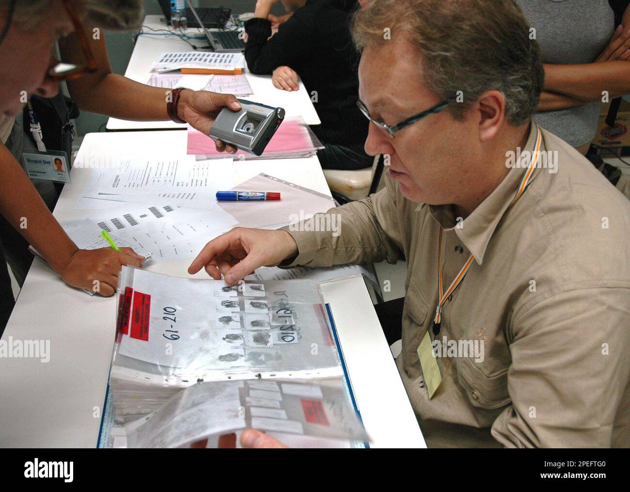 Mark Branchflower, a France-based Interpol fingerprint specialist ...