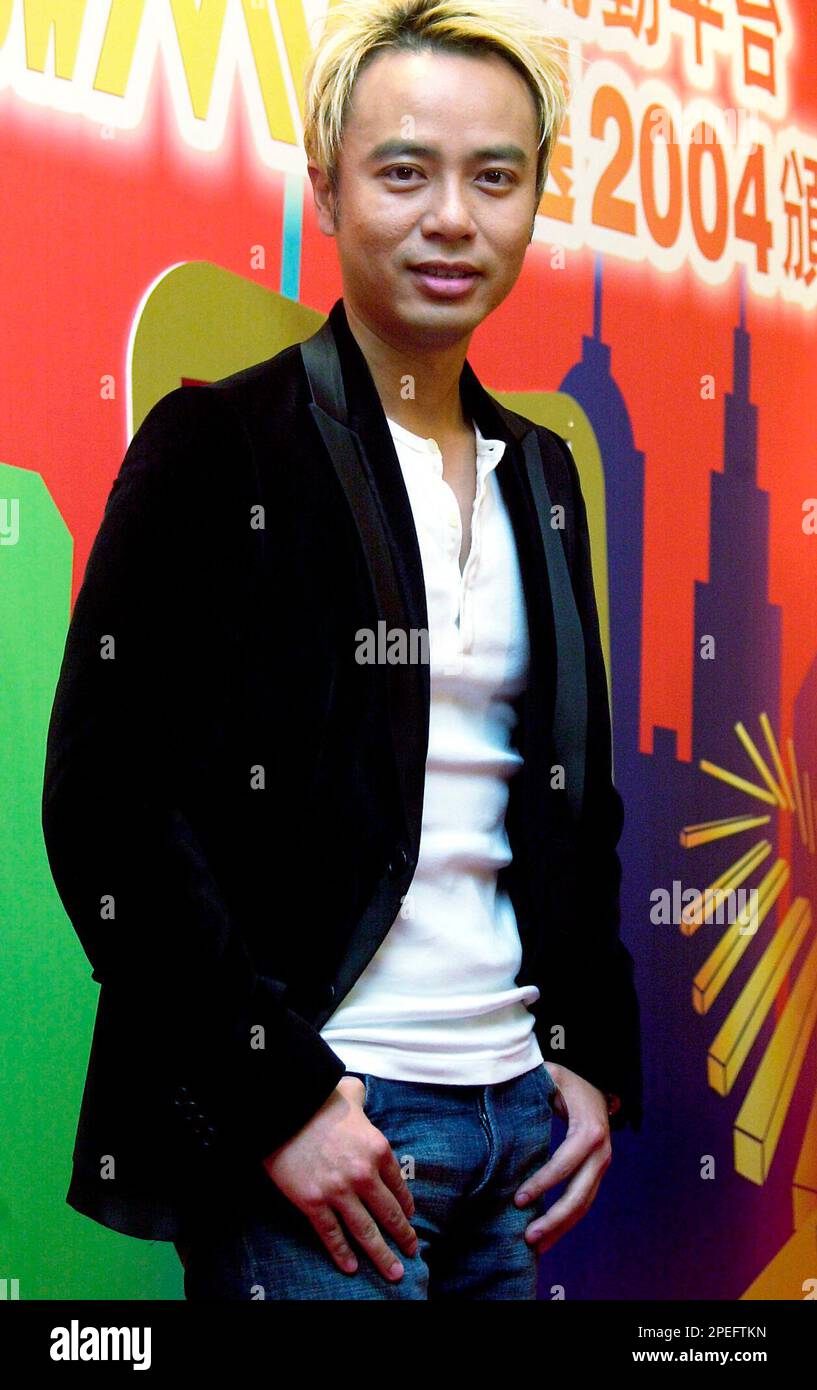 Hong Kong singer Hacken Lee poses for photographers at a Hong Kong ...