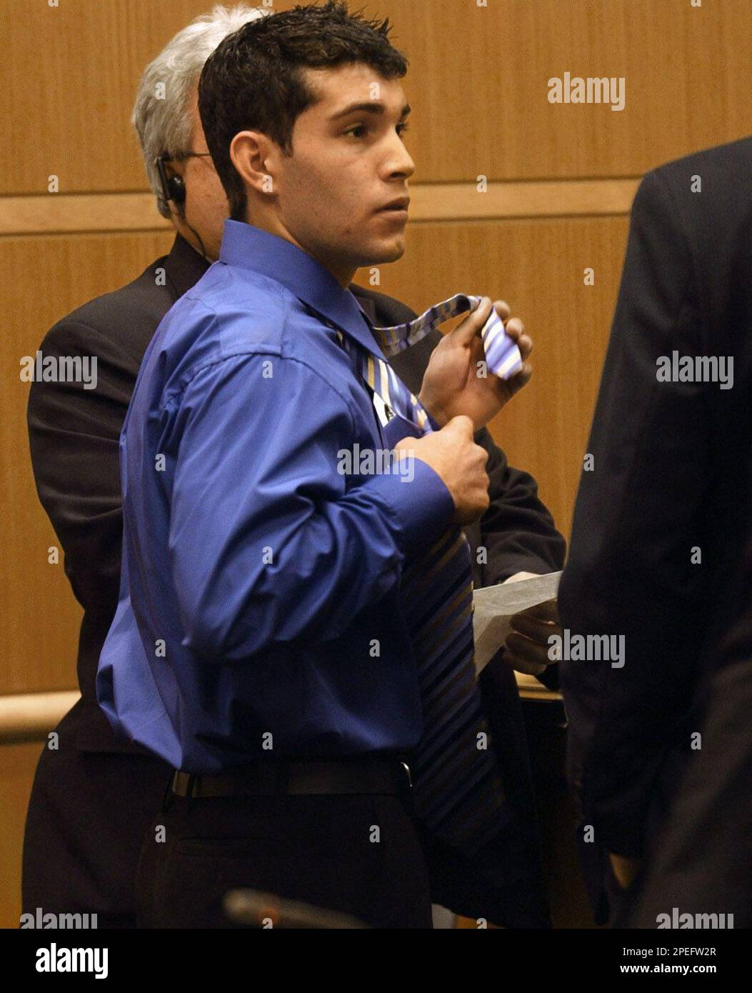 Bailiffs request that Louis Giannola IV, front, remove his tie before ...