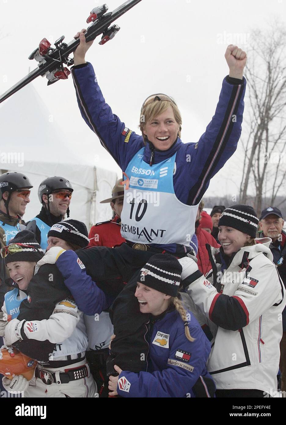 Aerial gold medallist Ryan St.Onge of the United States is carried by ...