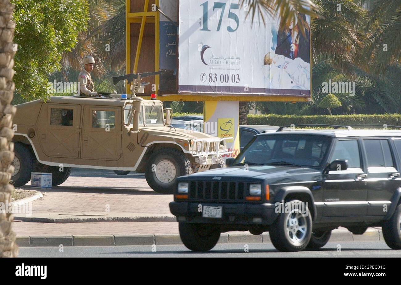 A Kuwait Army soldier manning a 50 cal.machine gun mounts guard in a ...