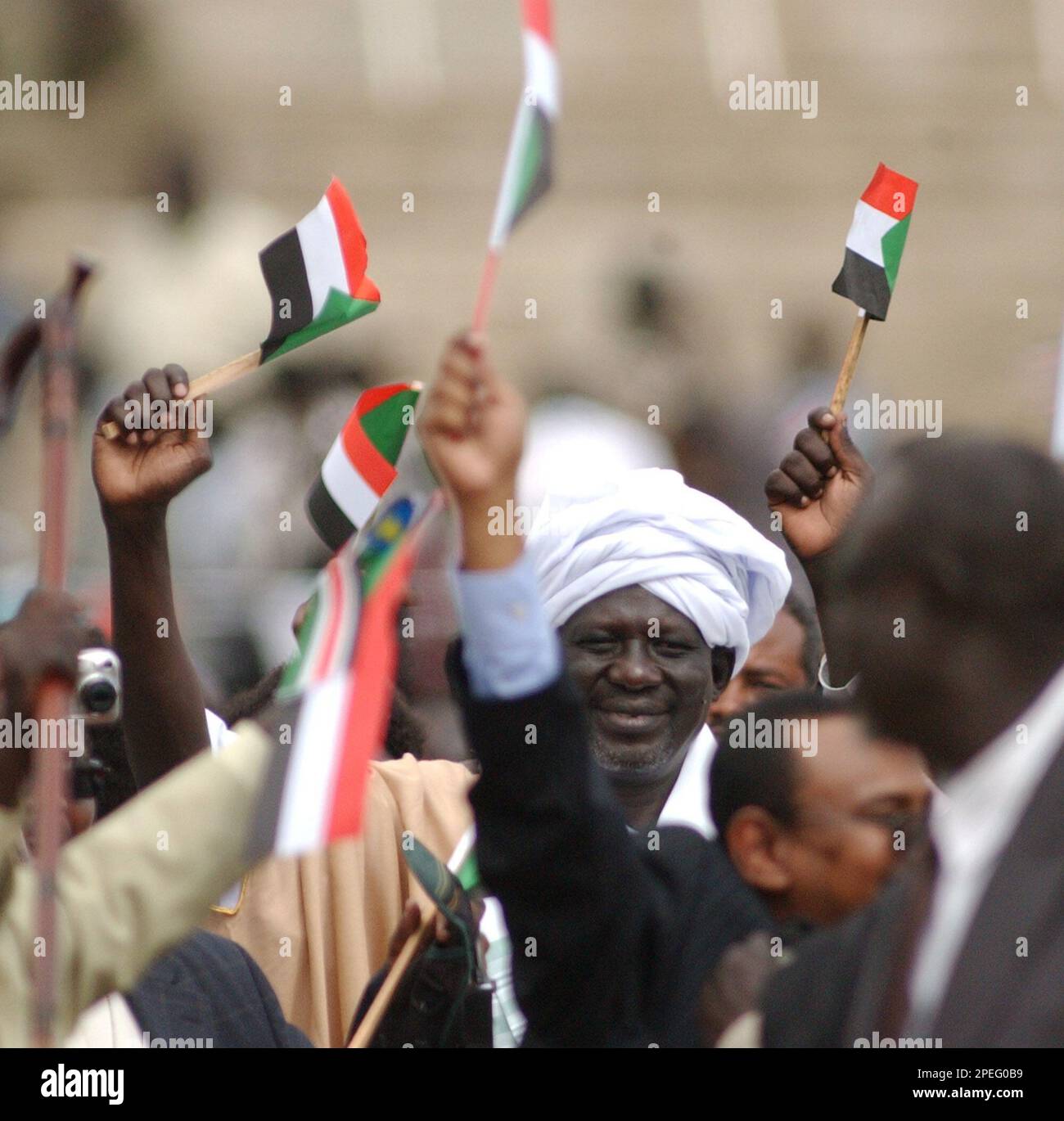 Supporters of the Sudanese Peoples Liberation Movement, holding SPLM ...