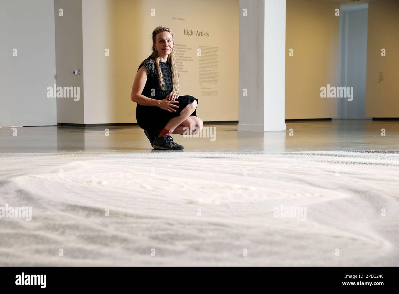 Artist Sandra Selig poses for a photograph alongside her art ...