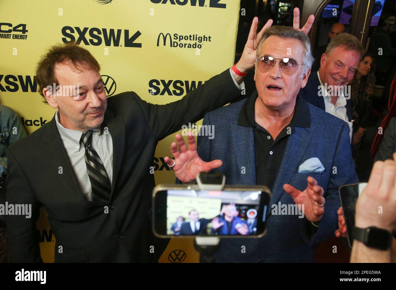 Bruce Campbell, right, and Sam Raimi arrive for the "Evil Dead Rise ...