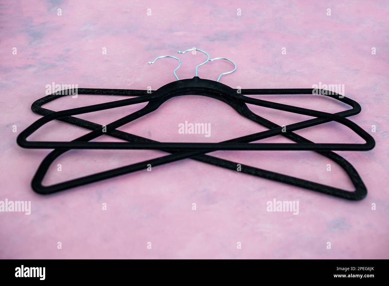 fashion and shopping concept, group of clothes hangers creating ...