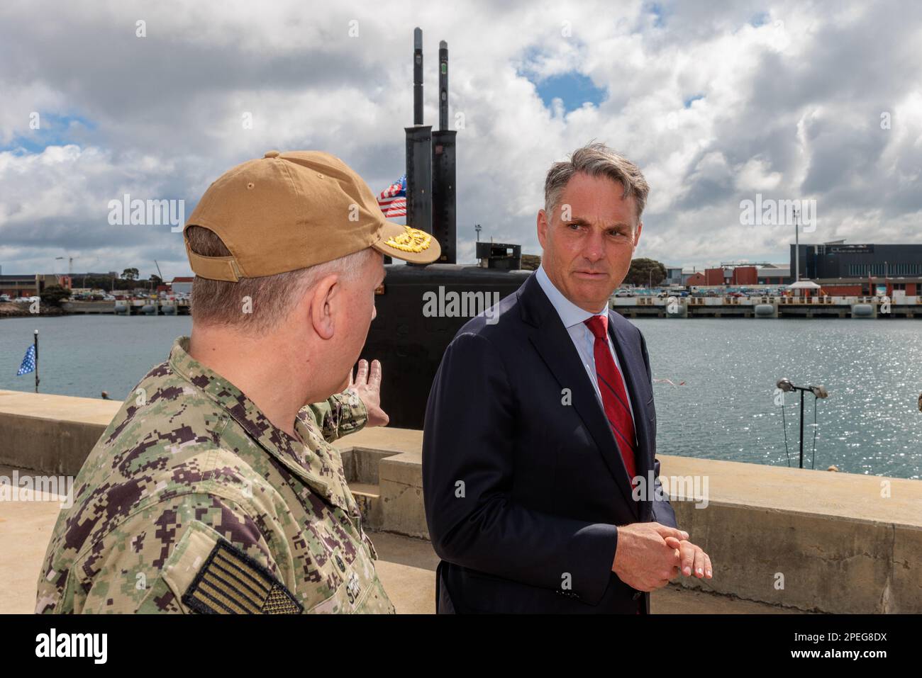 Acting Prime Minister Richard Marles speaks with Rear Admiral Richard ...