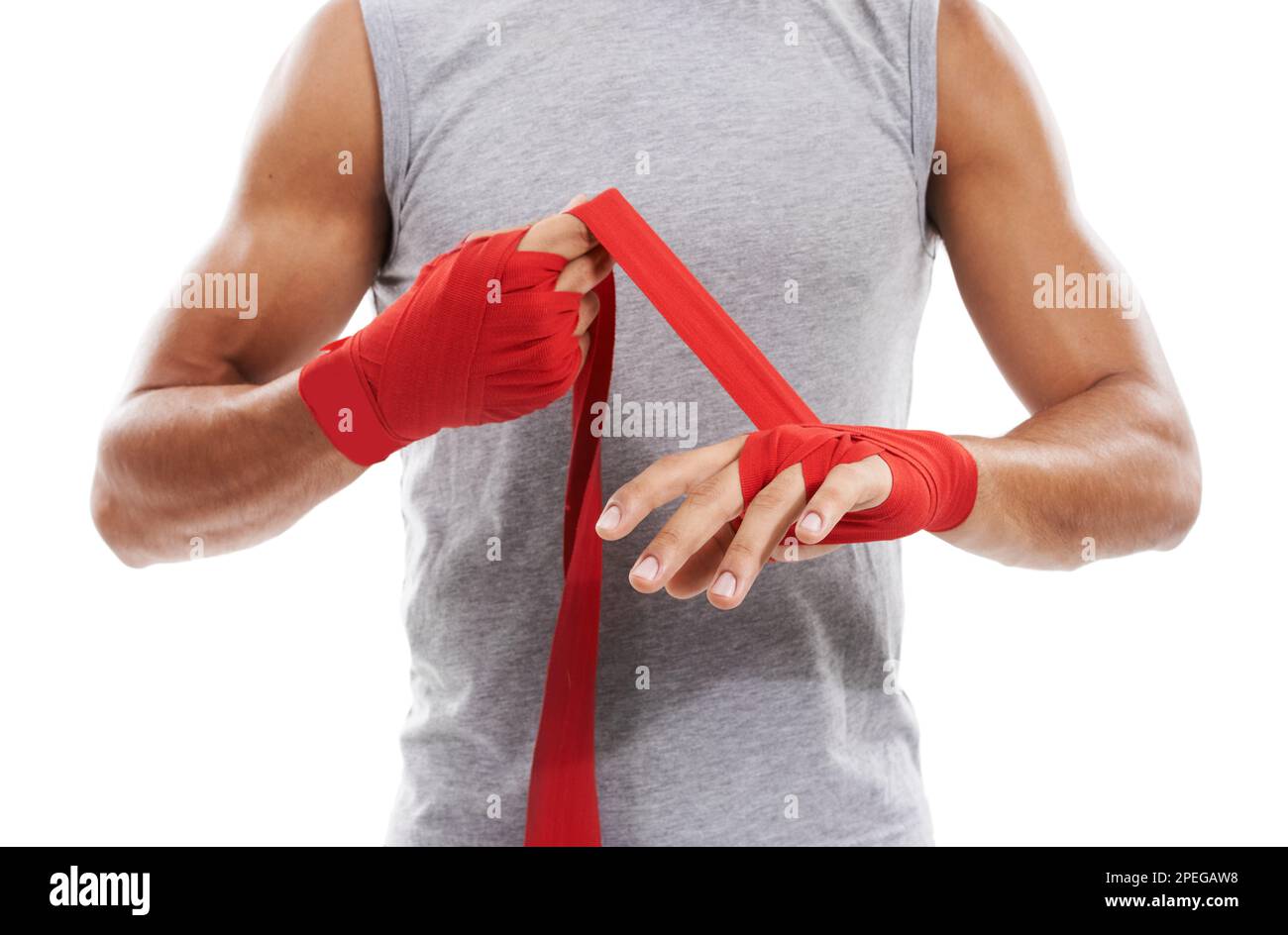 Preparing for a fight. Cropped image of a kick-boxer strapping his ...