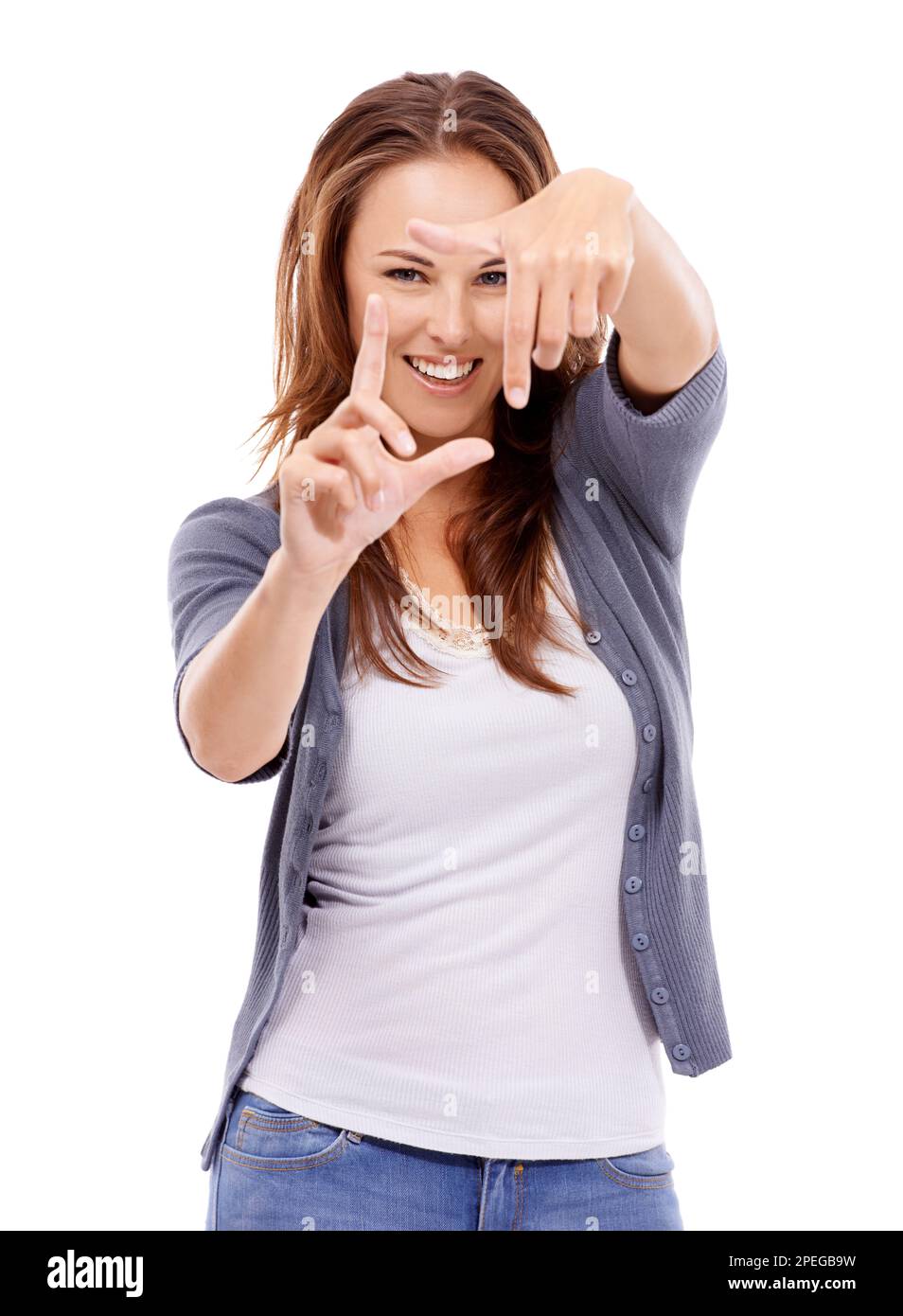 Framing woman. Casually dressed woman smiling while making a frame with ...