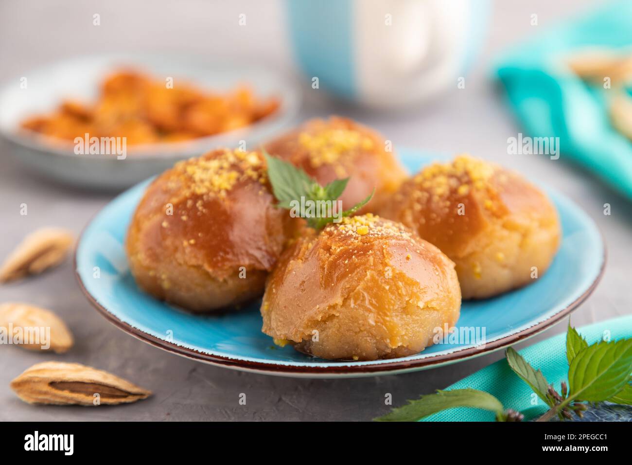 Homemade traditional turkish dessert sekerpare with almonds and honey ...