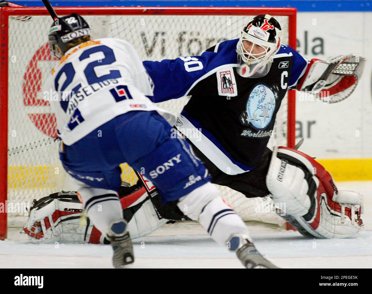 World Stars goaltender Martin Brodeur makes the save off Linkopings HC ...