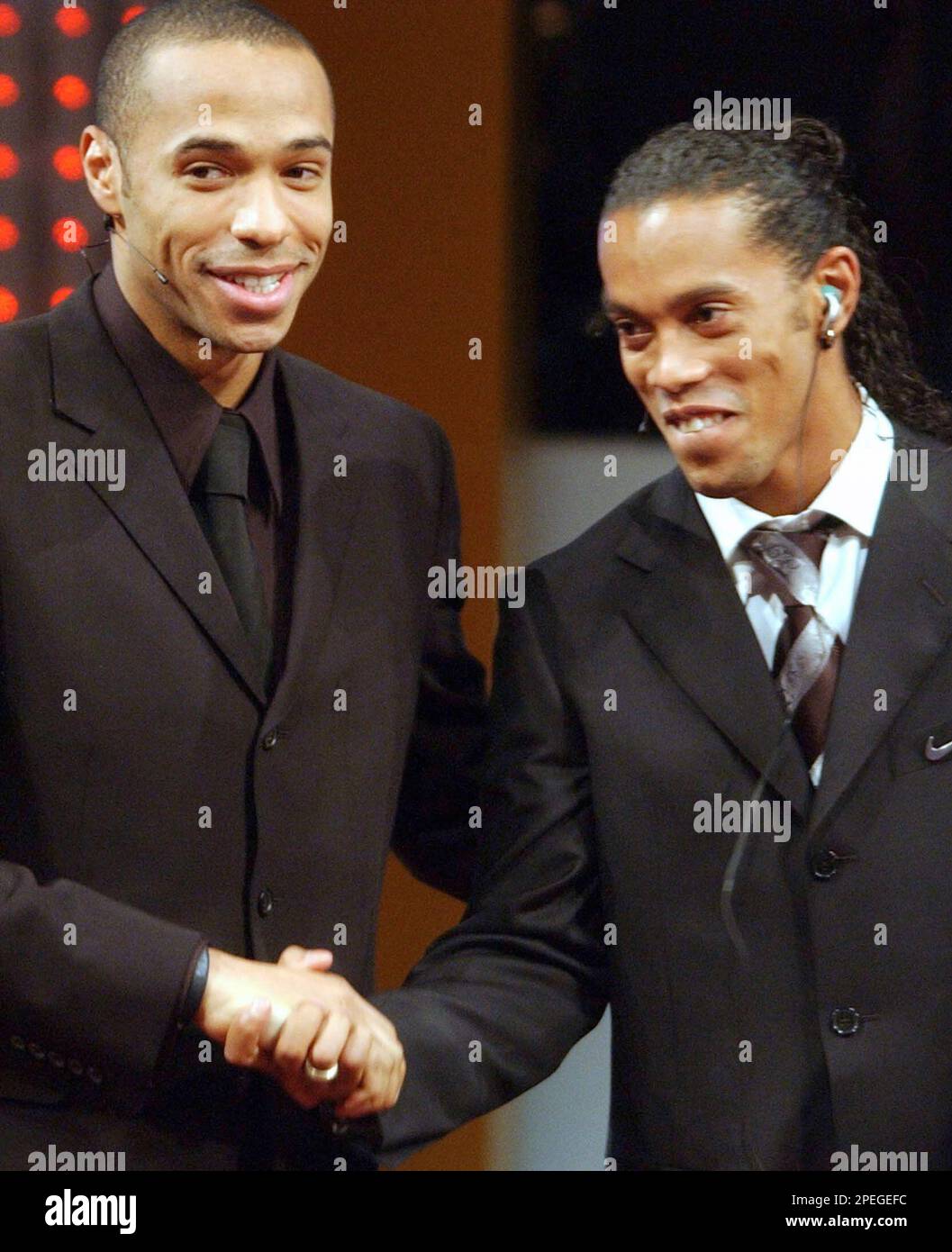 Thierry Henry from France, left, congratulates FC Barcelona's Brazilian ...