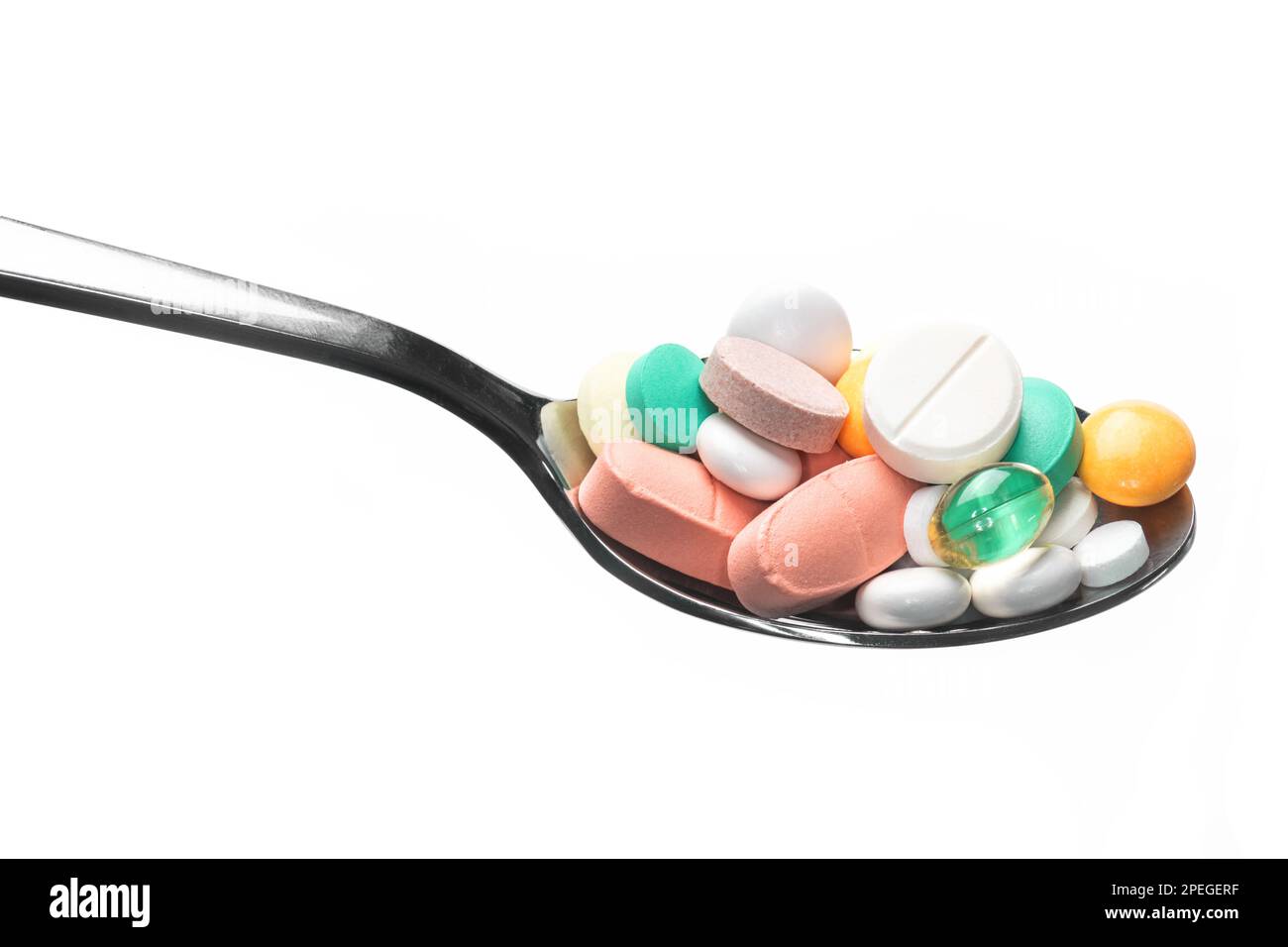Spoon with colored tablets hi-res stock photography and images - Alamy