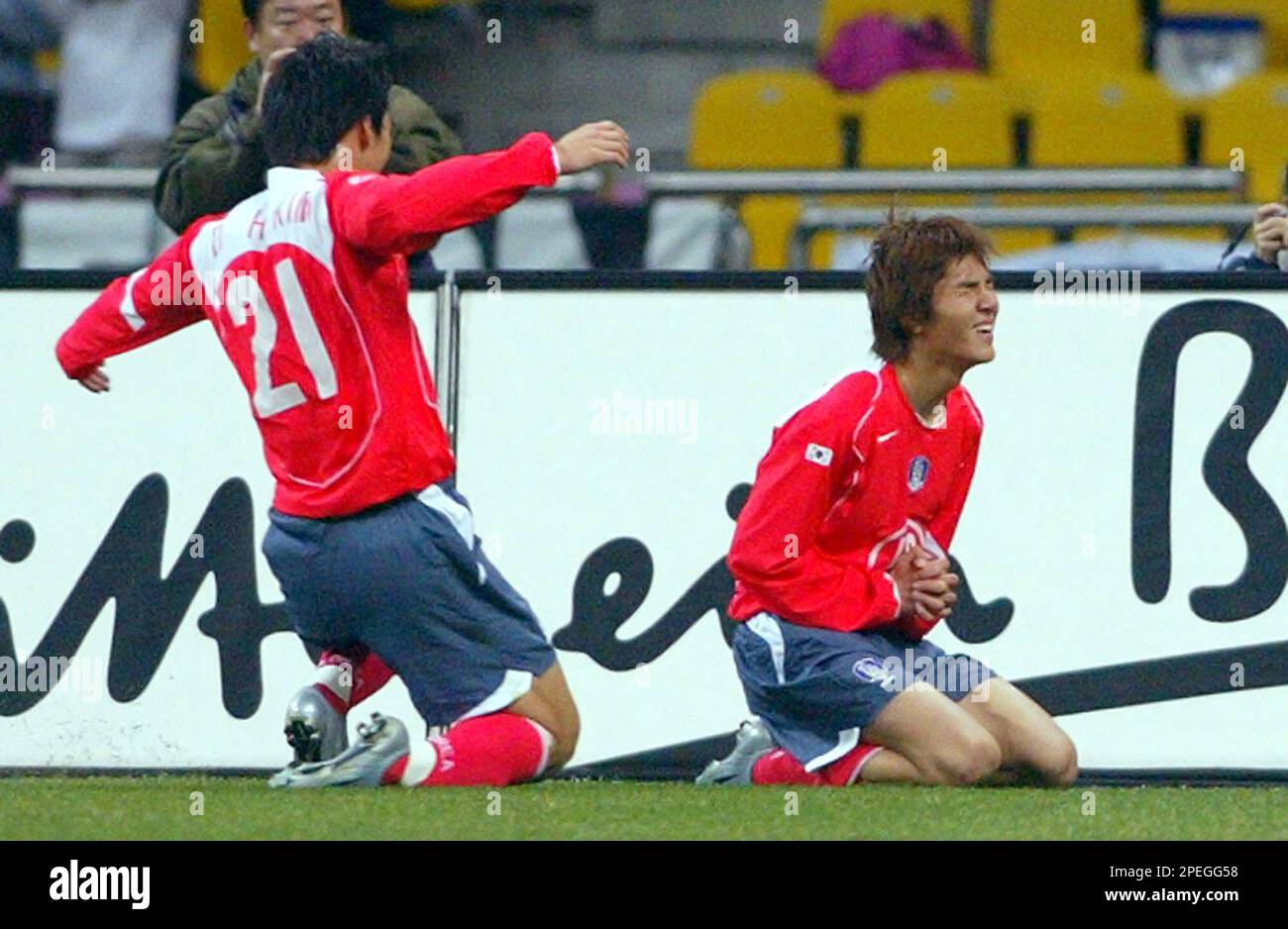 Korea's Kim Dong-hun, left, celebrates with Kim Dong-jin, right, during ...